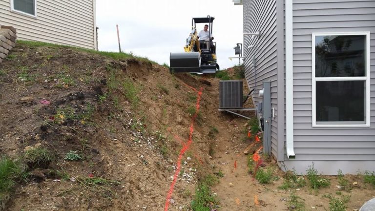 Retaining Wall Between Houses | Extreme Green Lawn & Landscape