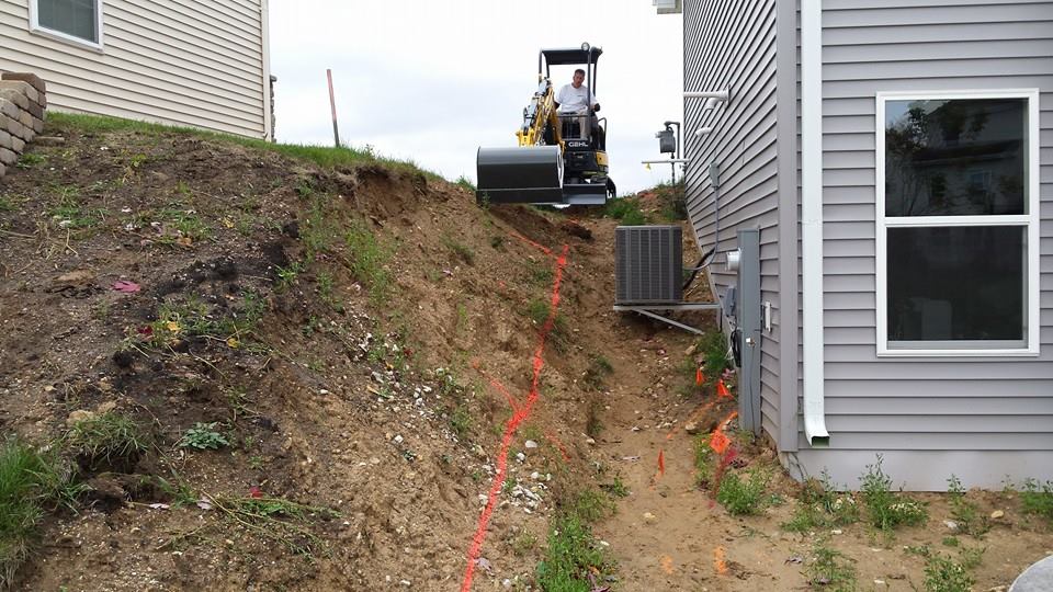 Retaining Wall Between Houses | Extreme Green Lawn & Landscape